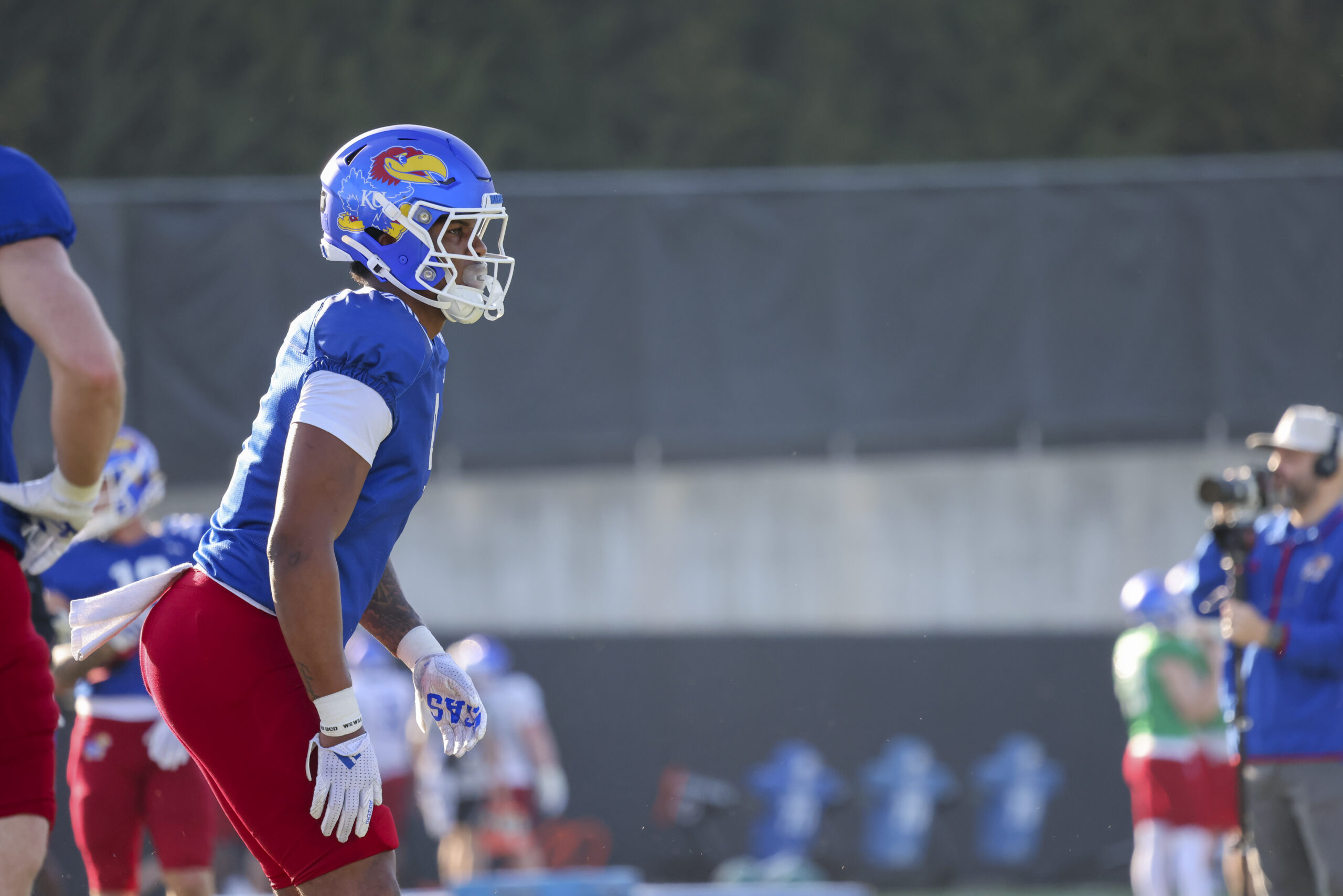 Former basketball player Butler now brings ‘nasty’ approach as KU tight ...